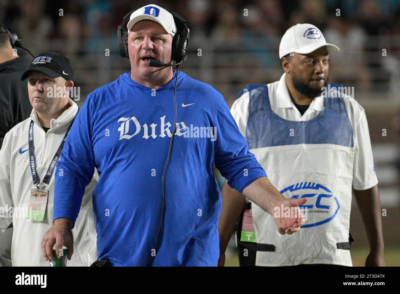 Duke head coach Mike Elko, front, walks along the sideline during the ...