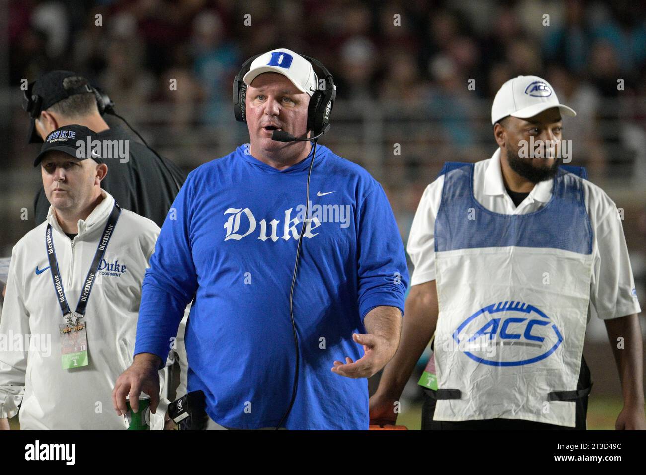 Duke head coach Mike Elko, front, walks along the sideline during the ...