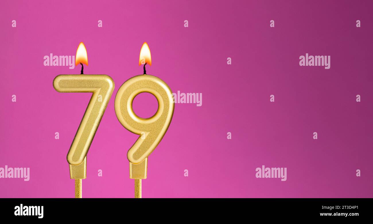 Candle number 79 in purple background - birthday card Stock Photo - Alamy