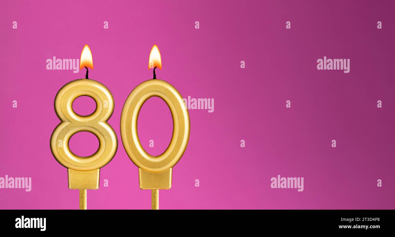 Birthday card with candle number 80 - purple background Stock Photo - Alamy