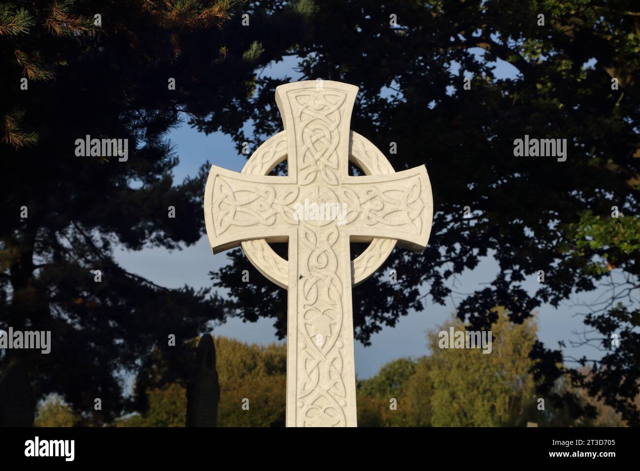 Celtic cross memorial stone in cemetery, stone carving Stock Photo - Alamy