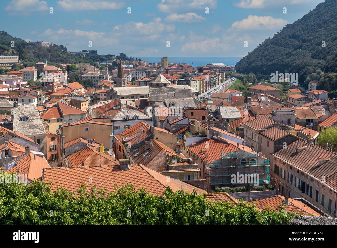 Elevated view of the medieval village with the sea in the background ...