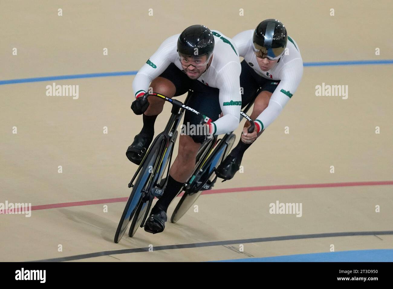 Mexico's cycling team Juan Teran, left, and Edgar Verdugo ride in the ...