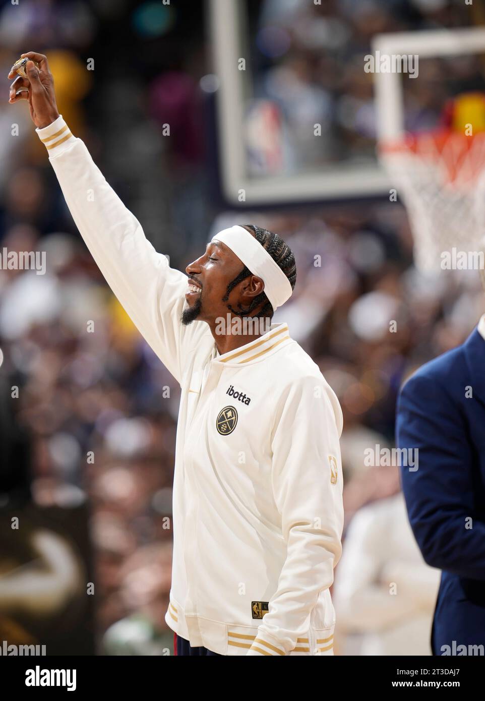 Denver Nuggets guard Kentavious Caldwell-Pope holds up his NBA ...