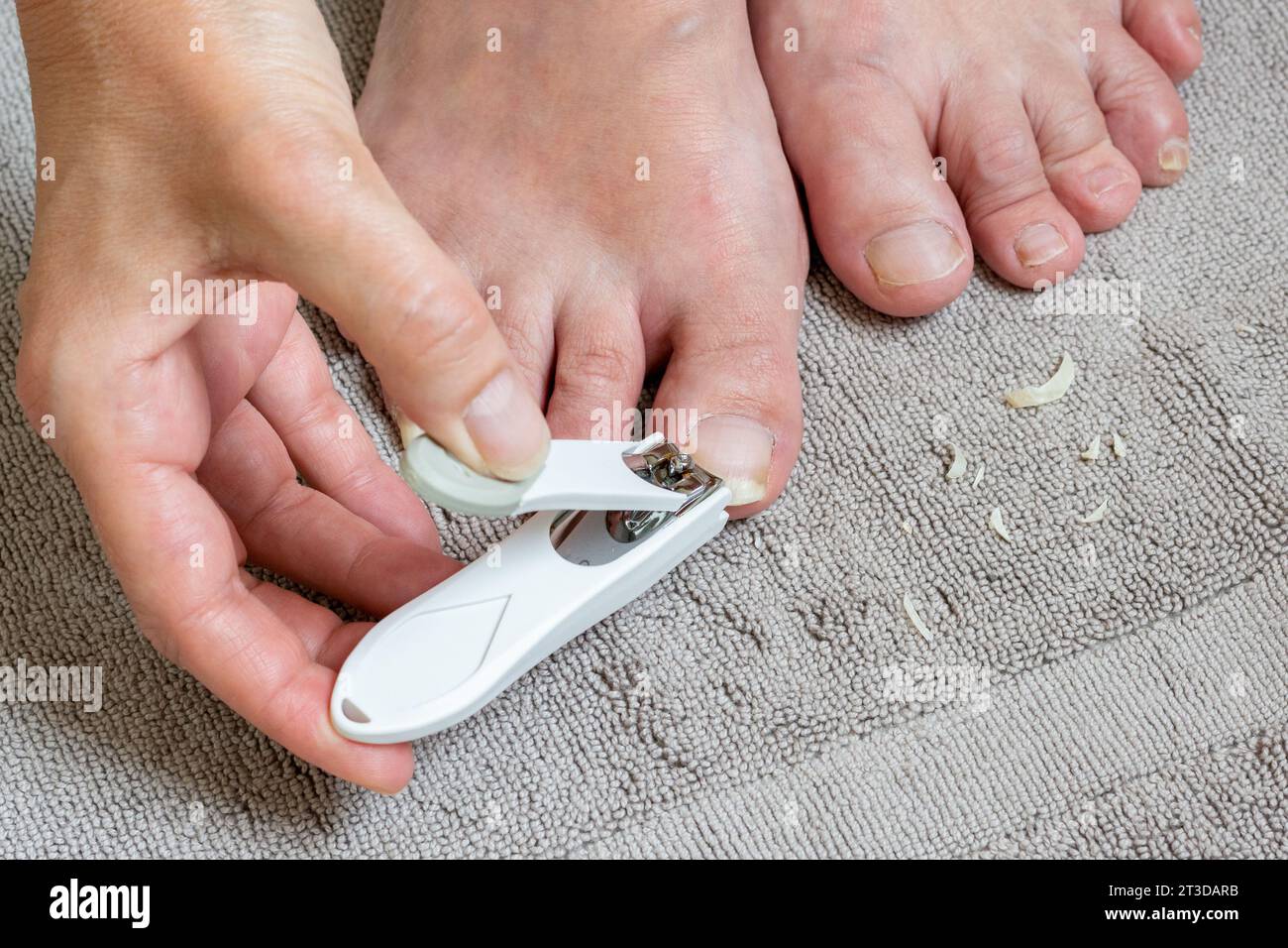 Cutting your toenails Stock Photo - Alamy