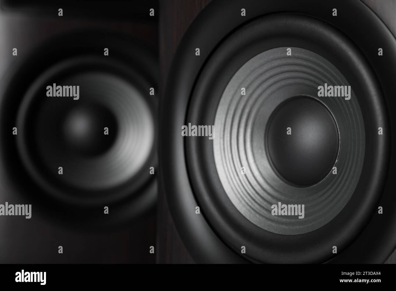 Two modern sound speakers as background, closeup Stock Photo - Alamy