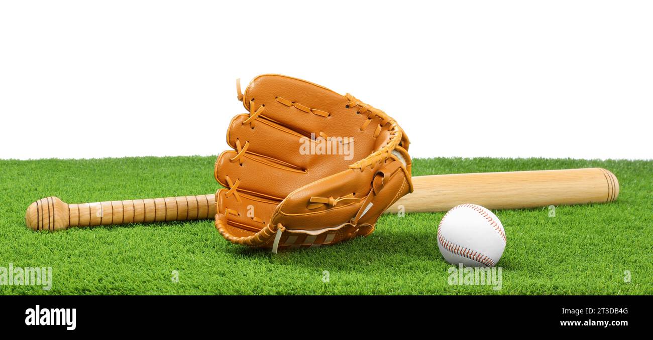 Baseball bat, ball and catcher's mitt on artificial grass against white ...