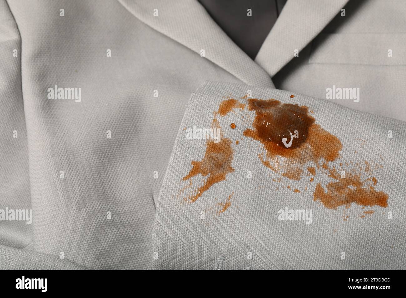 Dirty jacket with stain of coffee as background, closeup Stock Photo ...