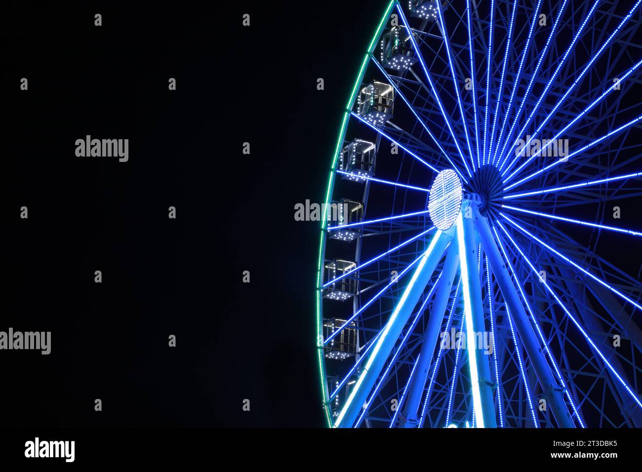 Beautiful glowing Ferris wheel against dark sky. Space for text Stock ...