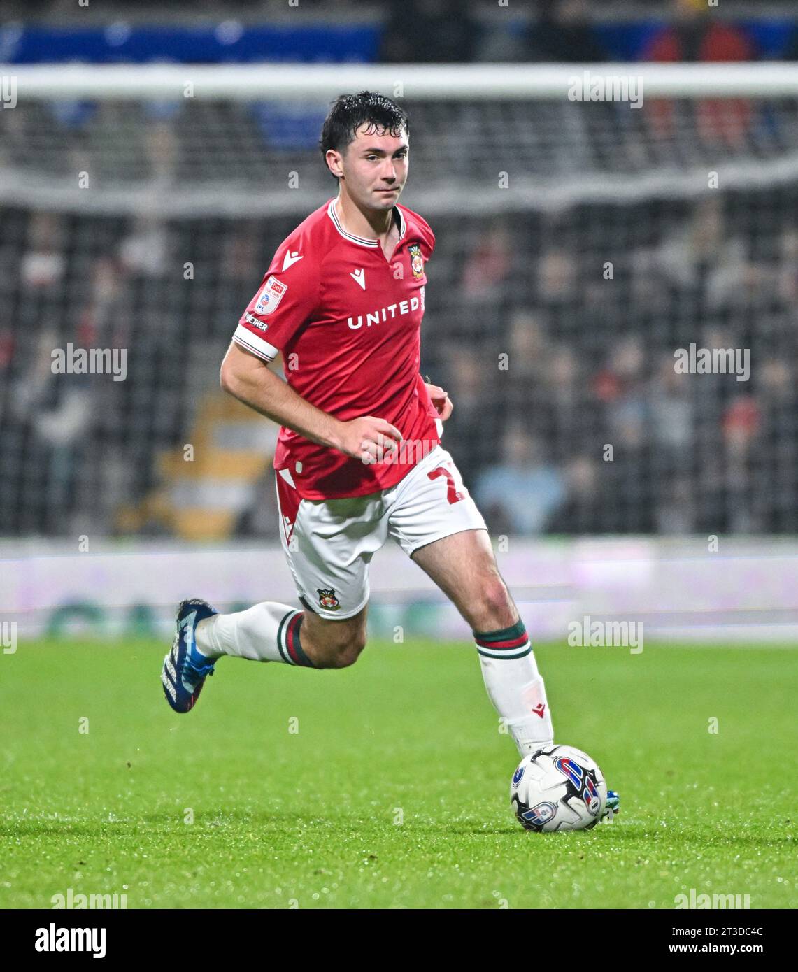 Thomas O'Connor 22# of Wrexham Association Football Club on the ball ...
