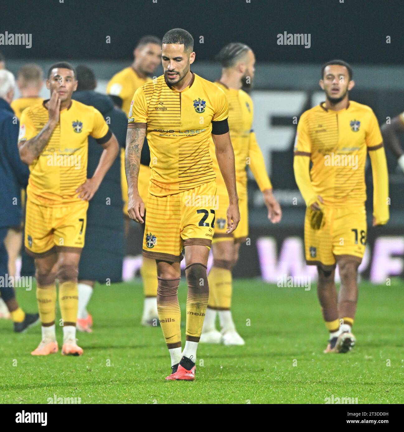 Joe Kizzi 22# of Sutton United Football Club looks dejected at full ...