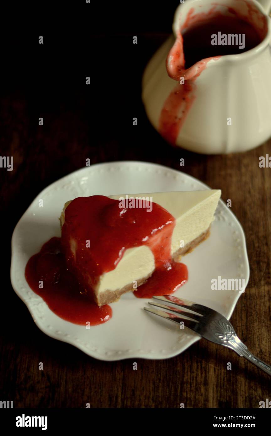 A beautiful and delicious vanilla cheesecake, drizzled with fresh ...