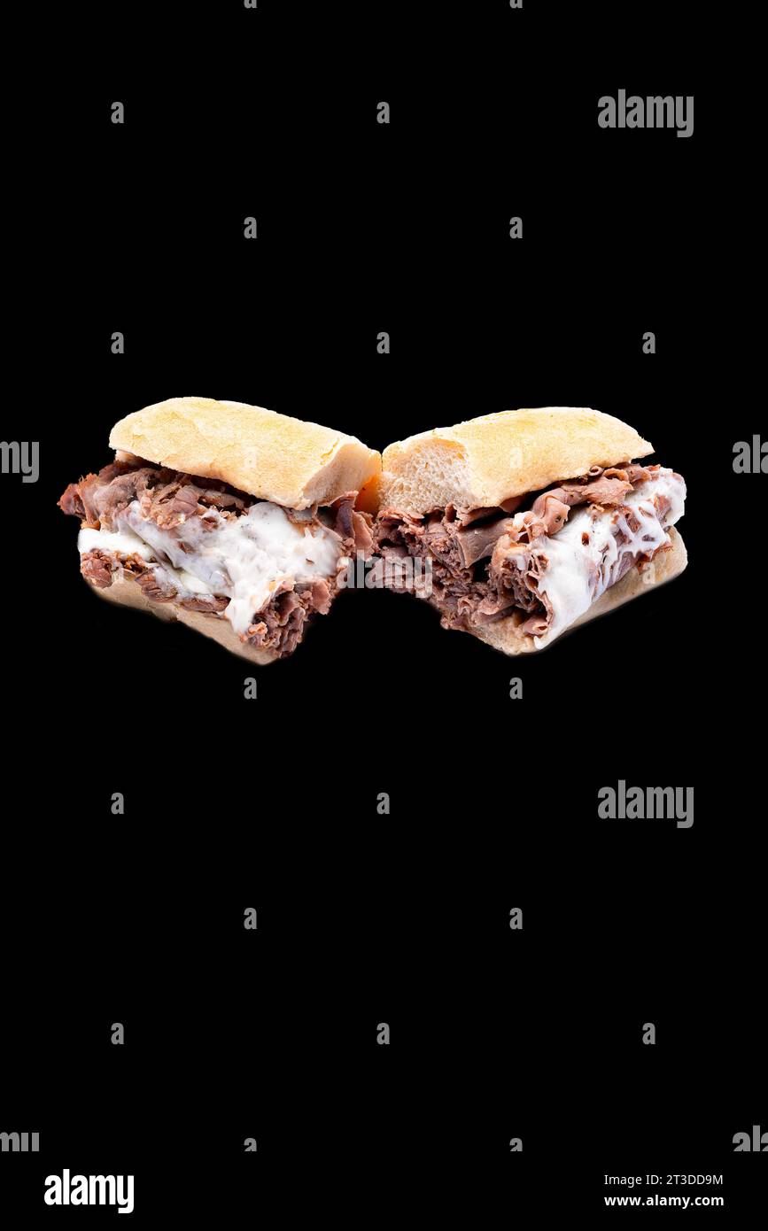 A large hoagie of sizzled steak and melting cheese for a philly cheese ...