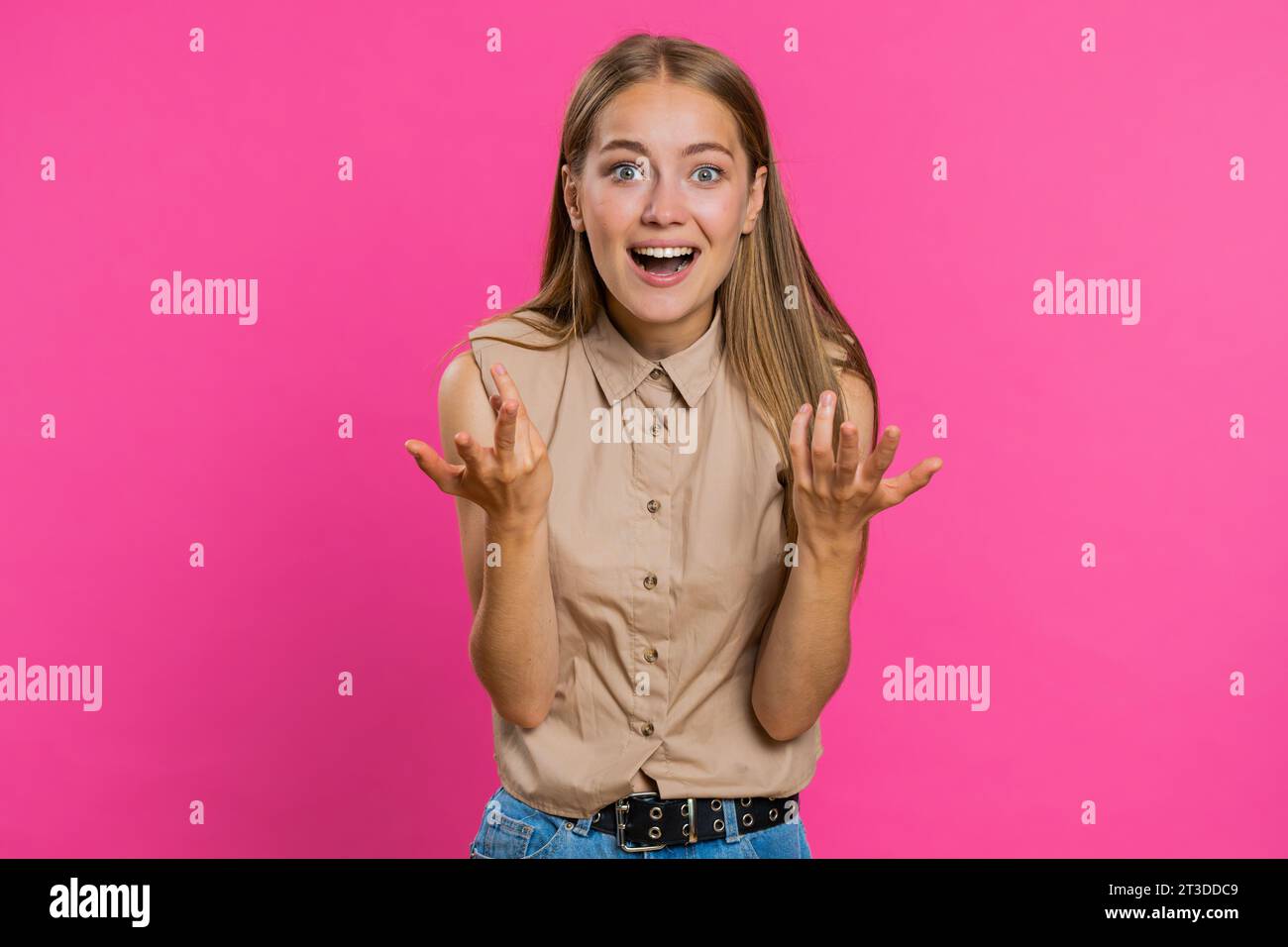 Oh my God, Wow. Excited amazed winner woman raising hands in surprise ...