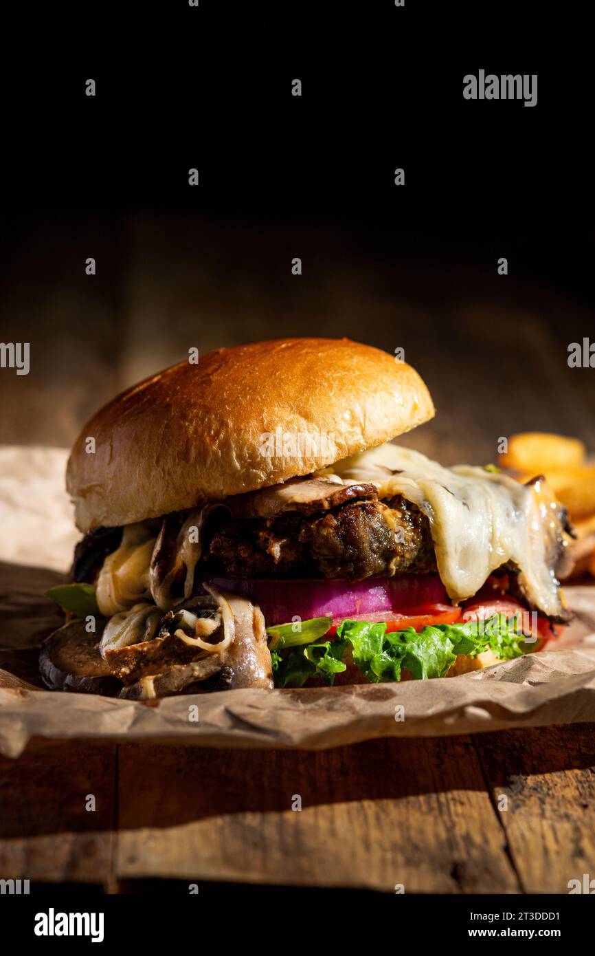Chopped and grilled Burger with melted white cheese, sauteed mushrooms ...