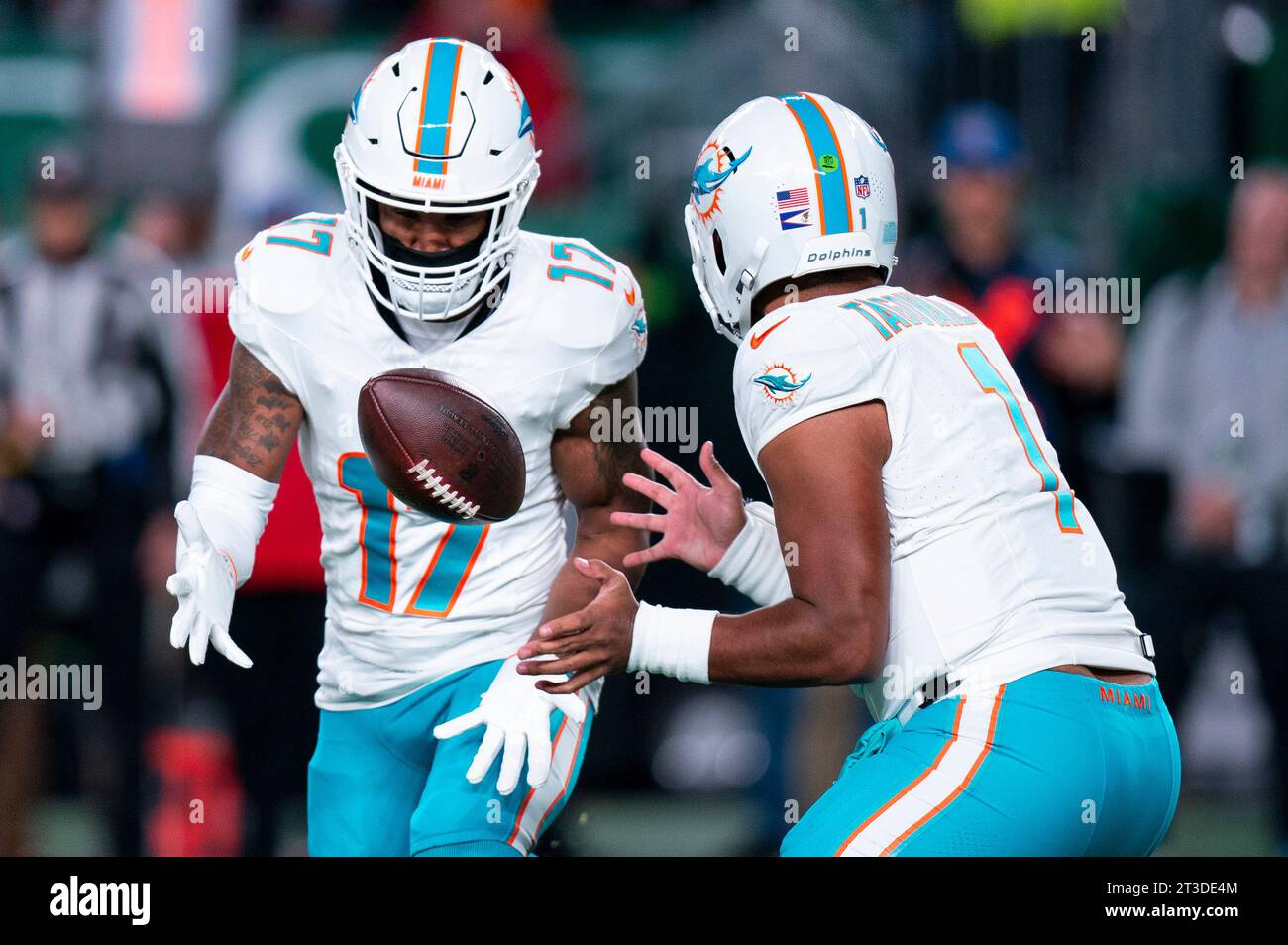 Miami Dolphins wide receiver Jaylen Waddle (17) takes the pitch from quarterback Tua Tagovailoa ...
