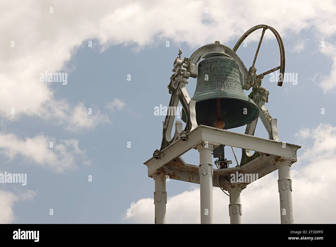 Church bell standing in red blue sky background, Rosbercon Assumption ...