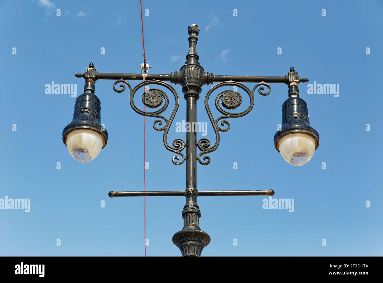 Double lights, placed at the beach side of the promenade, illuminate ...