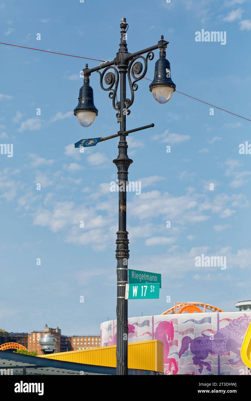 Double lights, placed at the beach side of the promenade, illuminate ...