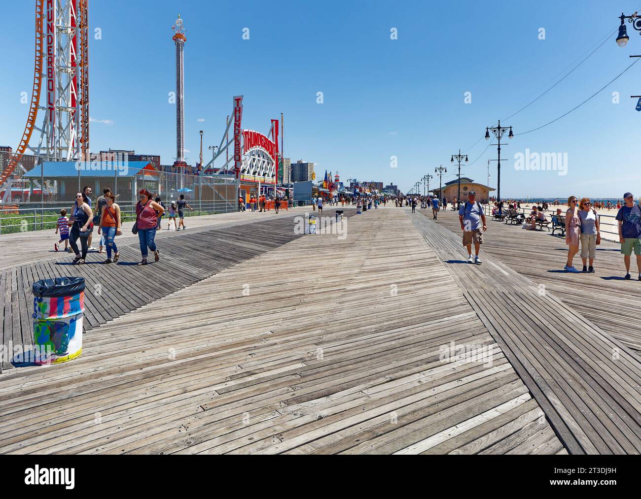 Riegelmann Boardwalk, a NYC scenic landmark, is a wood and concrete ...