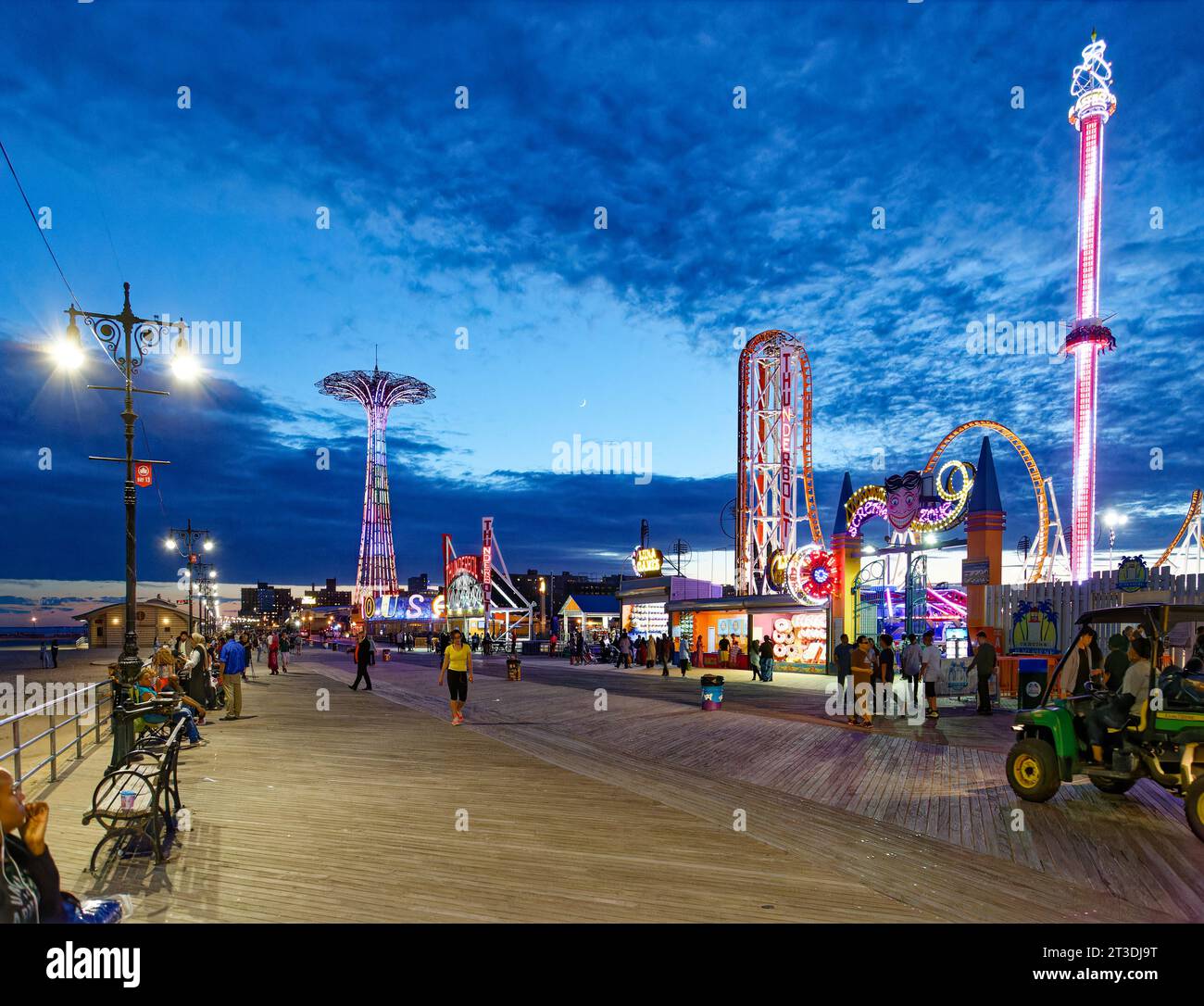 Riegelmann Boardwalk, a NYC scenic landmark, is a wood and concrete ...