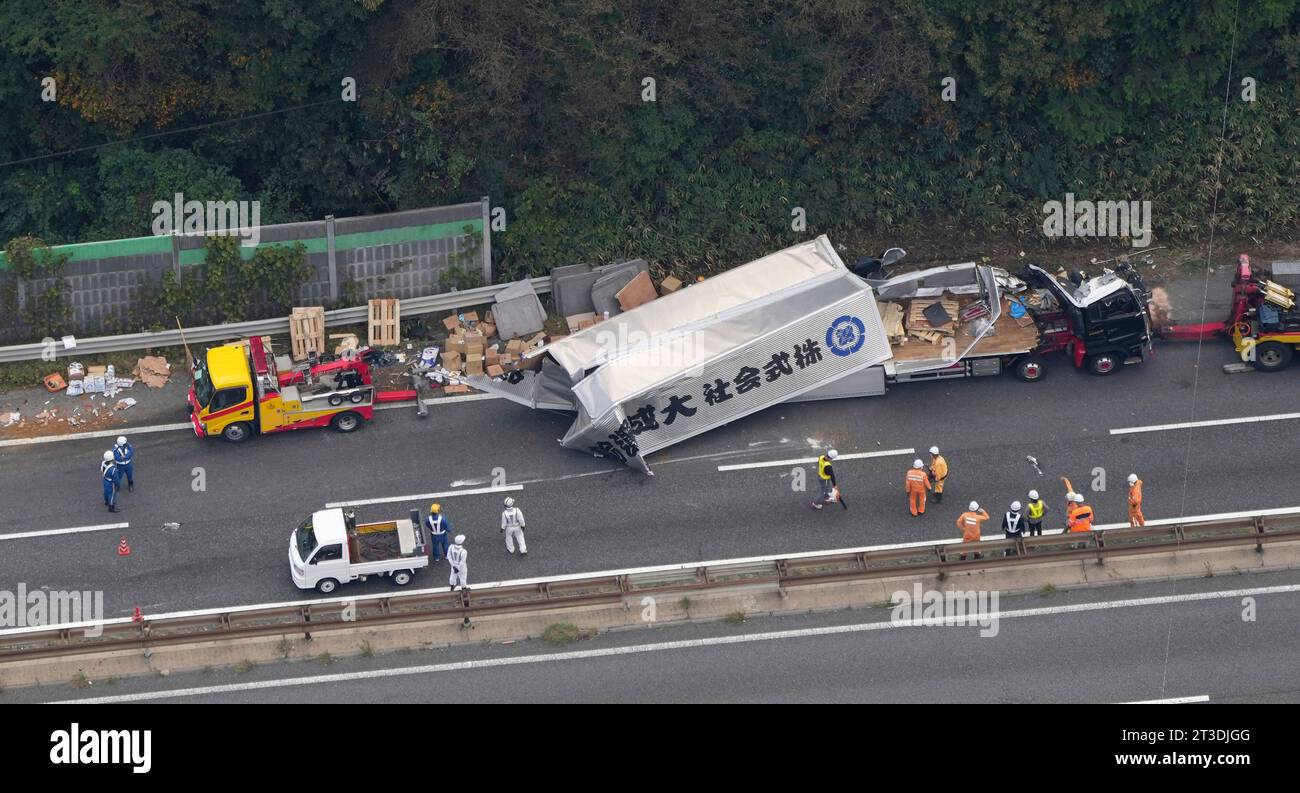 An aerial photo shows an accident involving three trucks and other ...