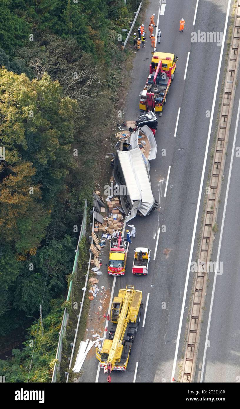 An aerial photo shows an accident involving three trucks and other ...