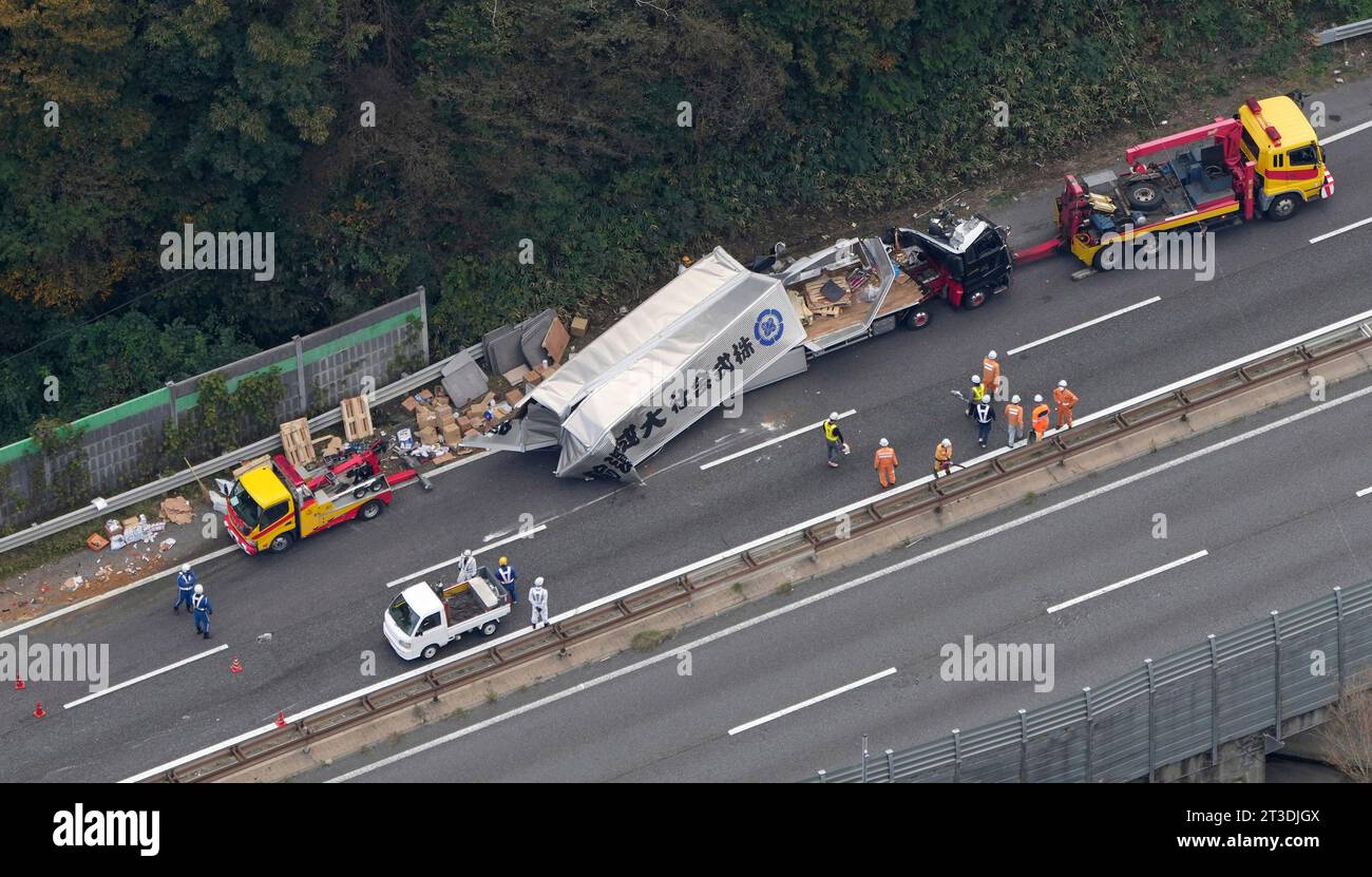 An aerial photo shows an accident involving three trucks and other ...
