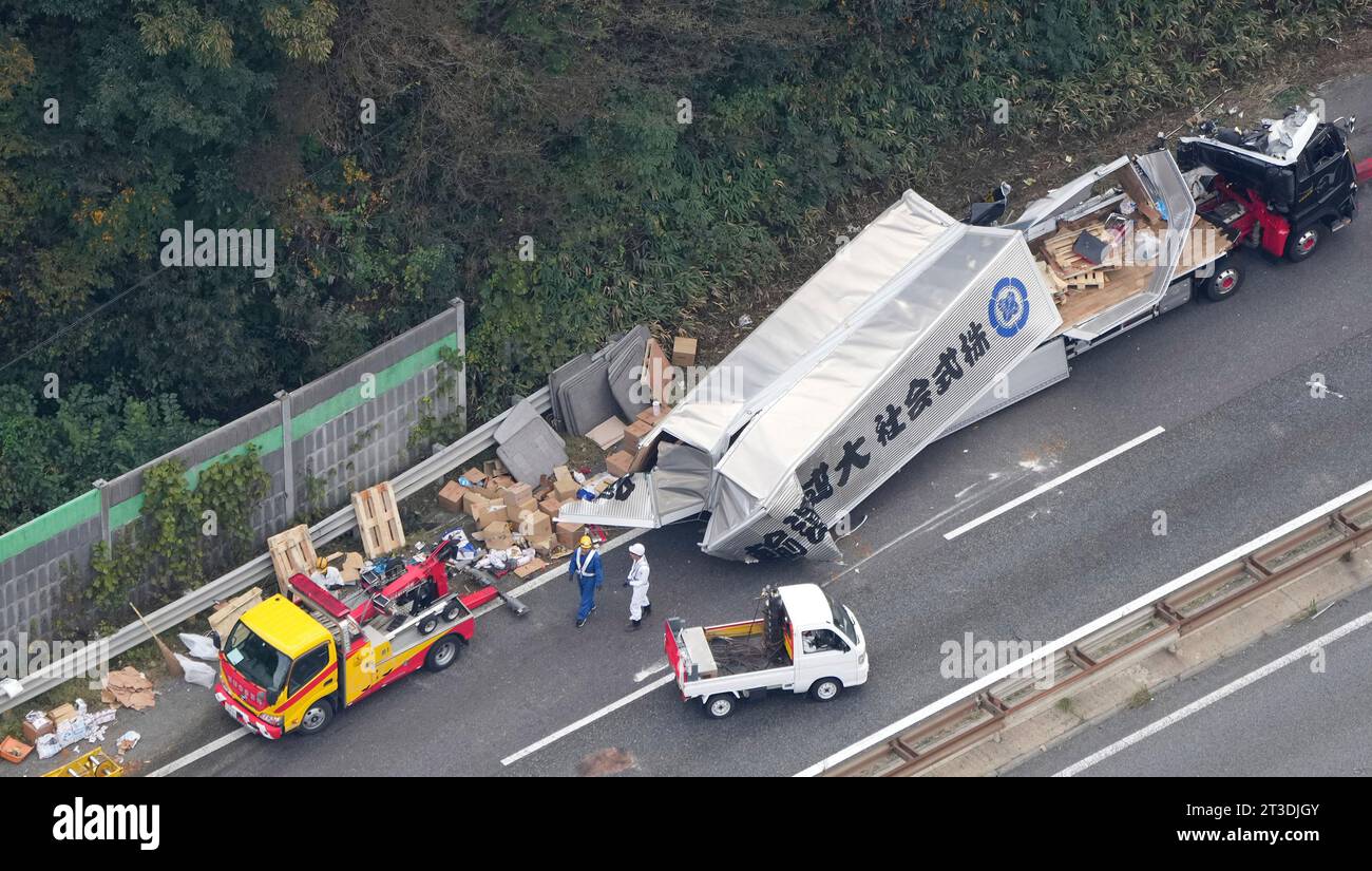 An aerial photo shows an accident involving three trucks and other ...