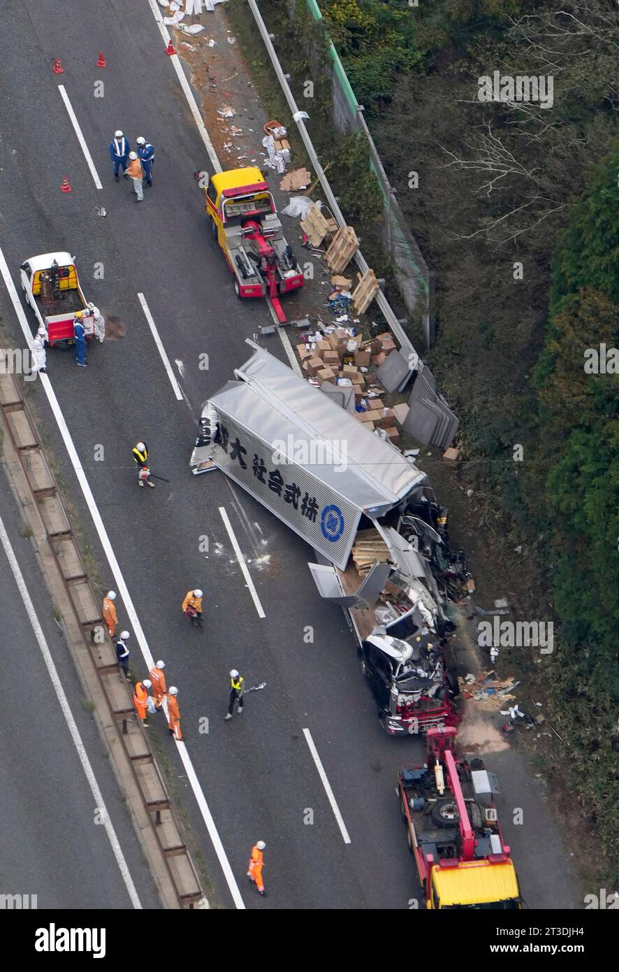 An aerial photo shows an accident involving three trucks and other ...