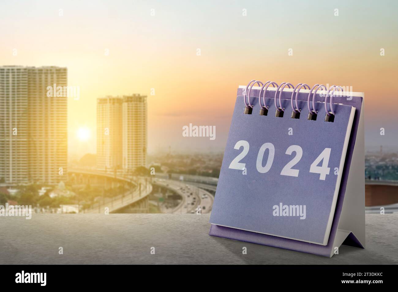 Calendar of 2024 with cityscapes background. Happy New Year 2024 Stock Photo - Alamy
