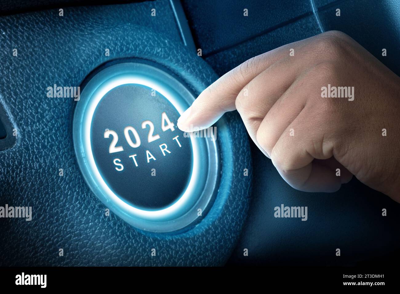 Human hand hit the 2024 button to start the new year. Happy New Year ...