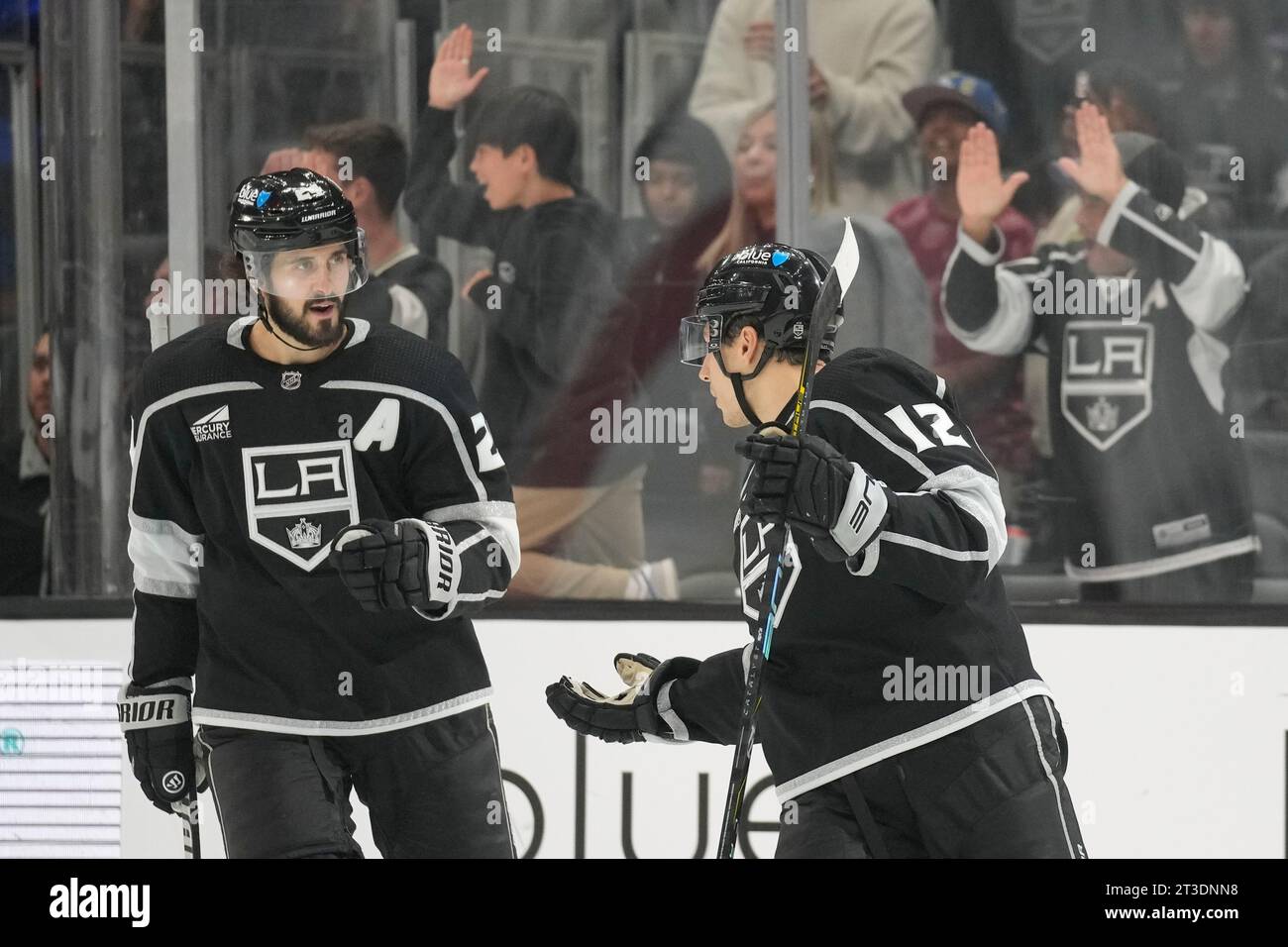 Los Angeles Kings center Trevor Moore (12) celebrates with center ...