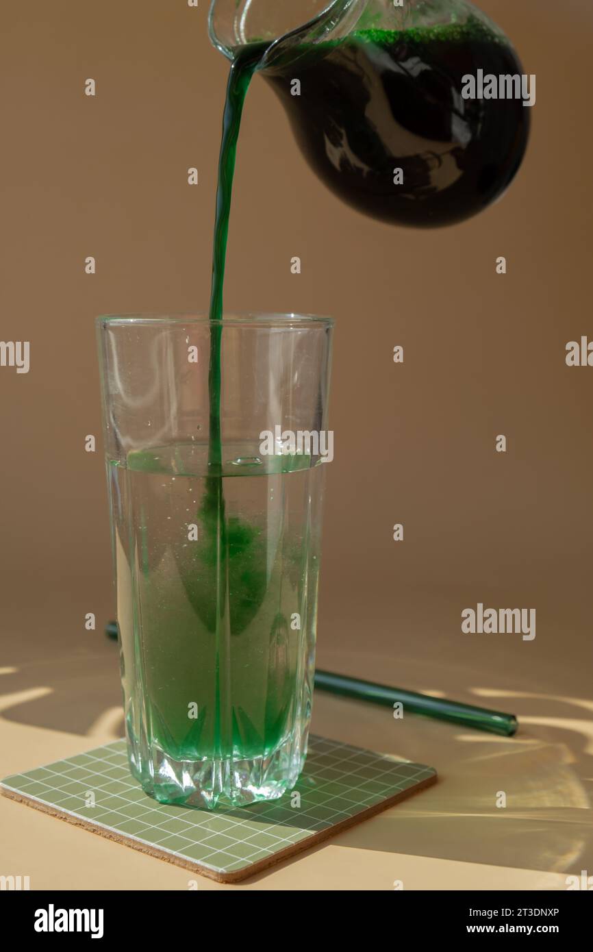 Organic blue-green algae spirulina detox drink in glass powder food ...