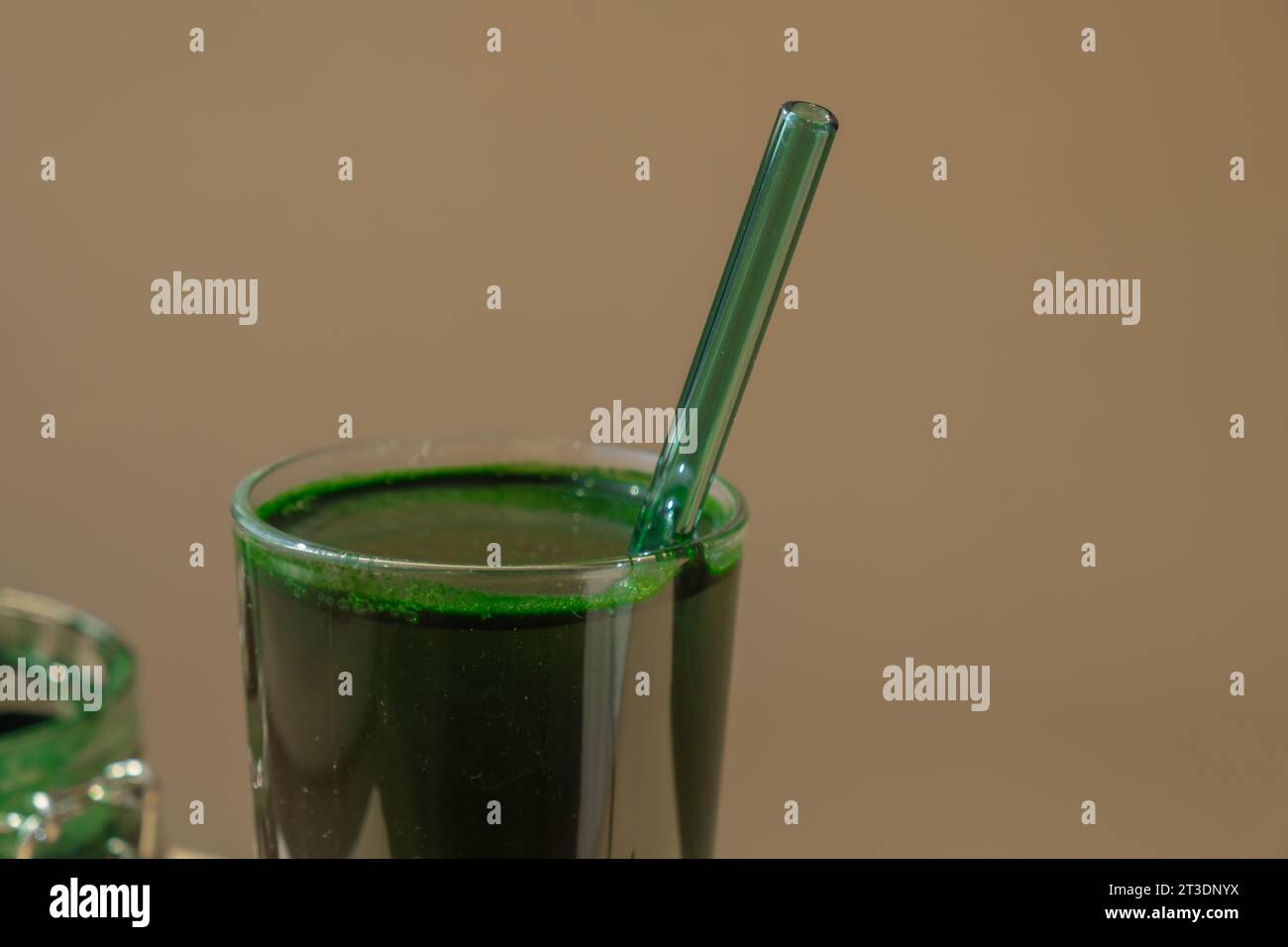 Organic blue-green algae spirulina detox drink in glass powder food ...