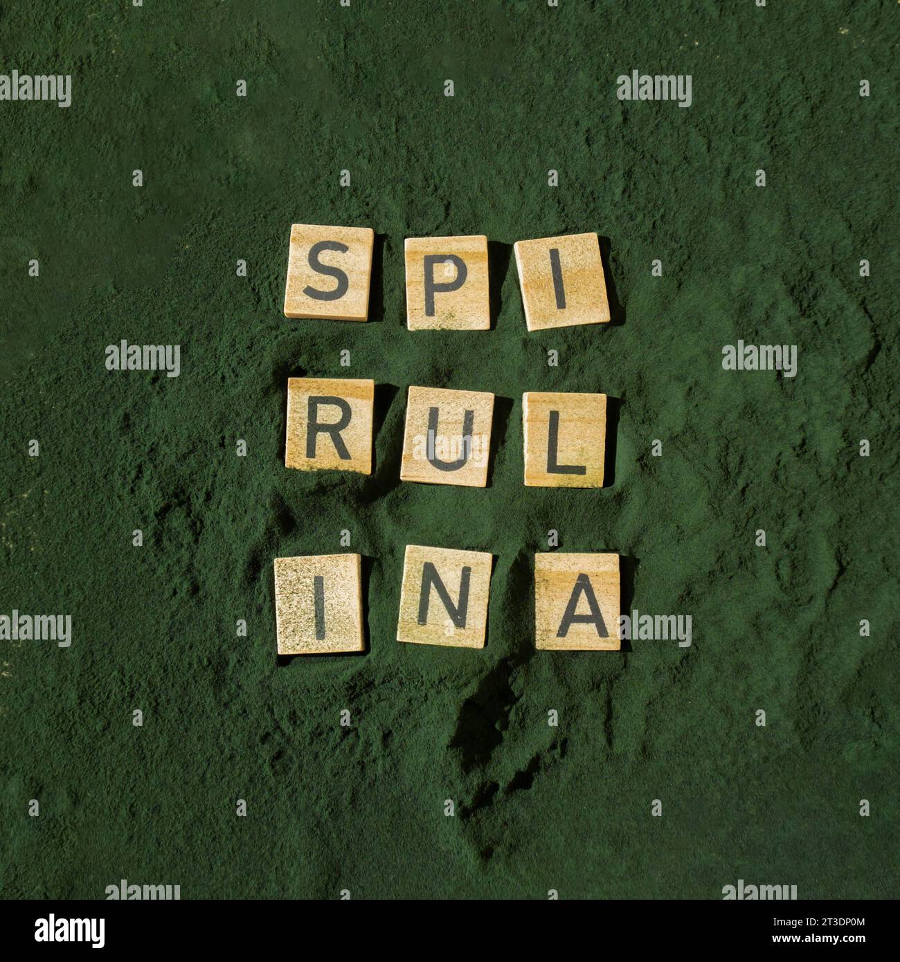 SPIRULINA letter chlorella on green background of algae superfood ...