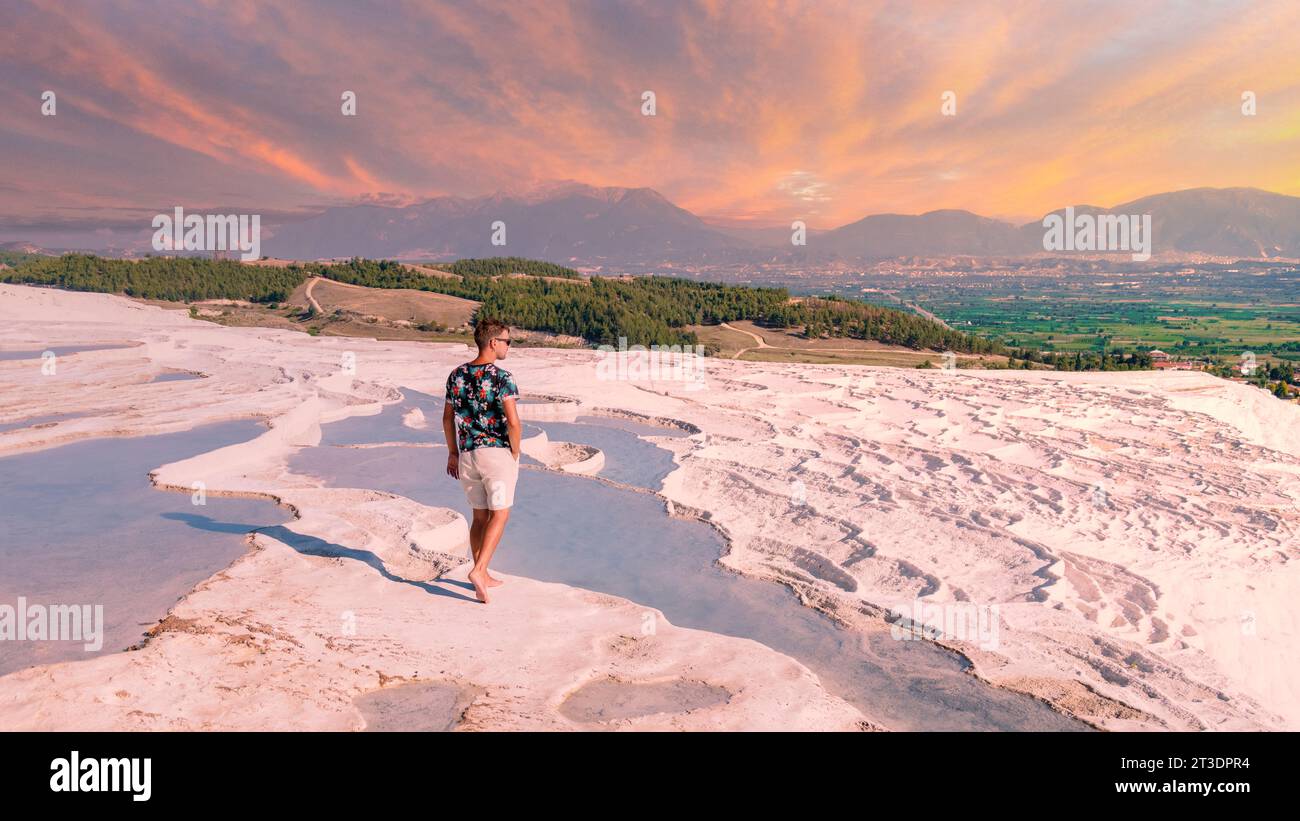 Natural travertine pools and terraces in Pamukkale. Cotton castle in ...