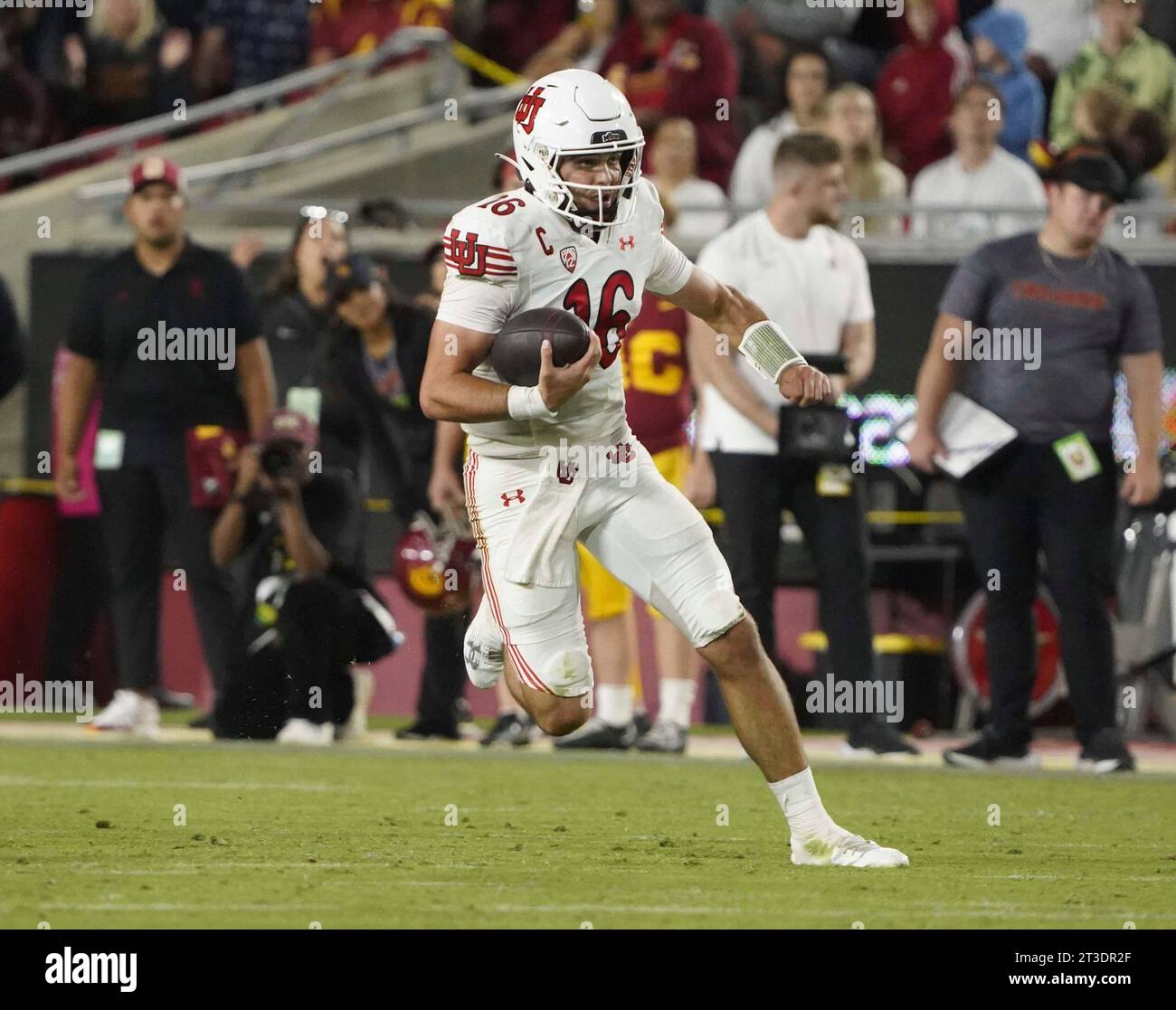 Utah Utes quarterback Bryson Barnes (16) makes a play with the football ...