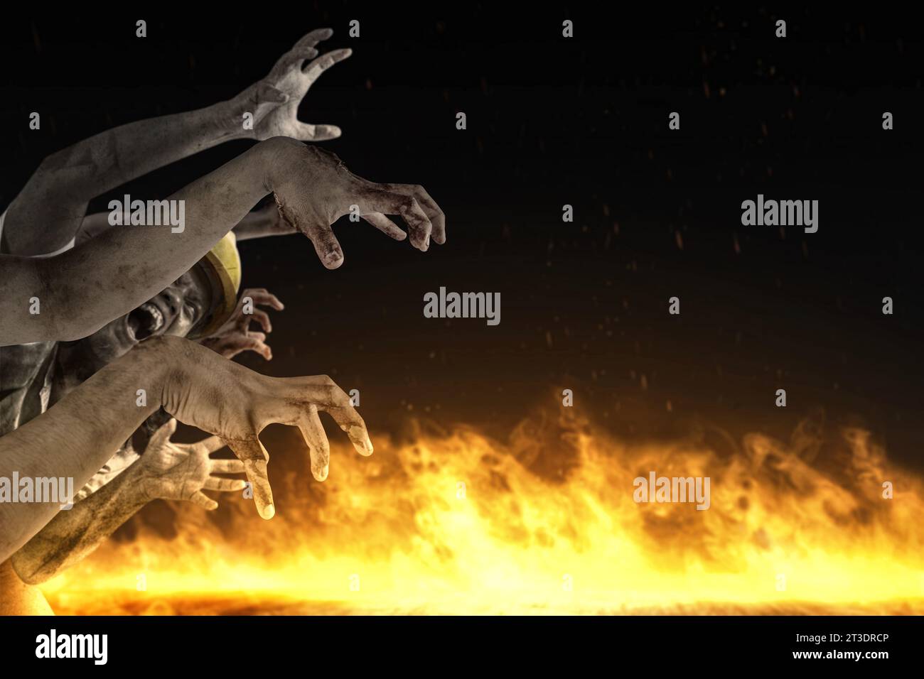 Zombie hands with a fire flames background. Scary Halloween concept ...