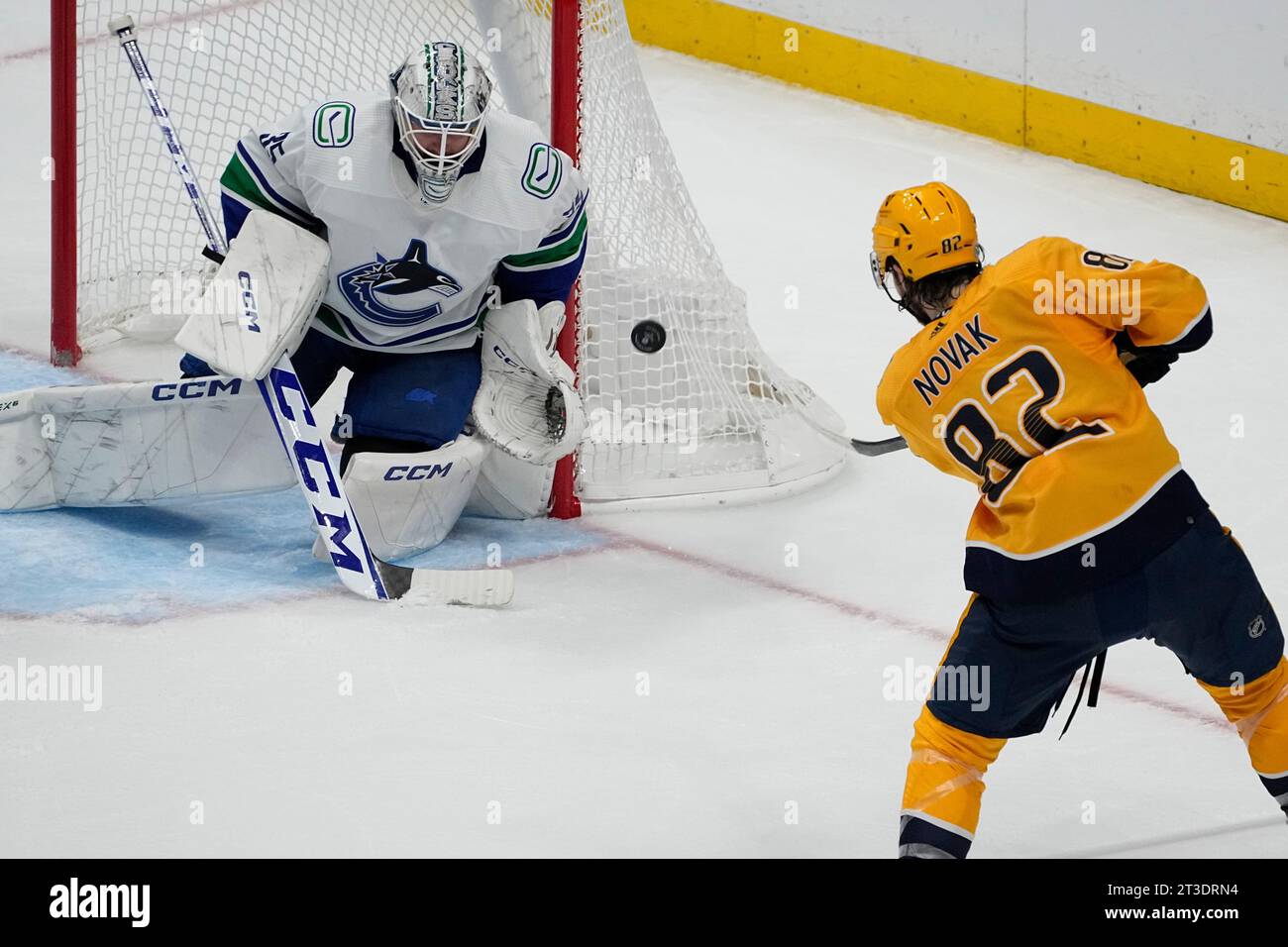 Nashville Predators center Tommy Novak (82) tries to shoot the puck ...