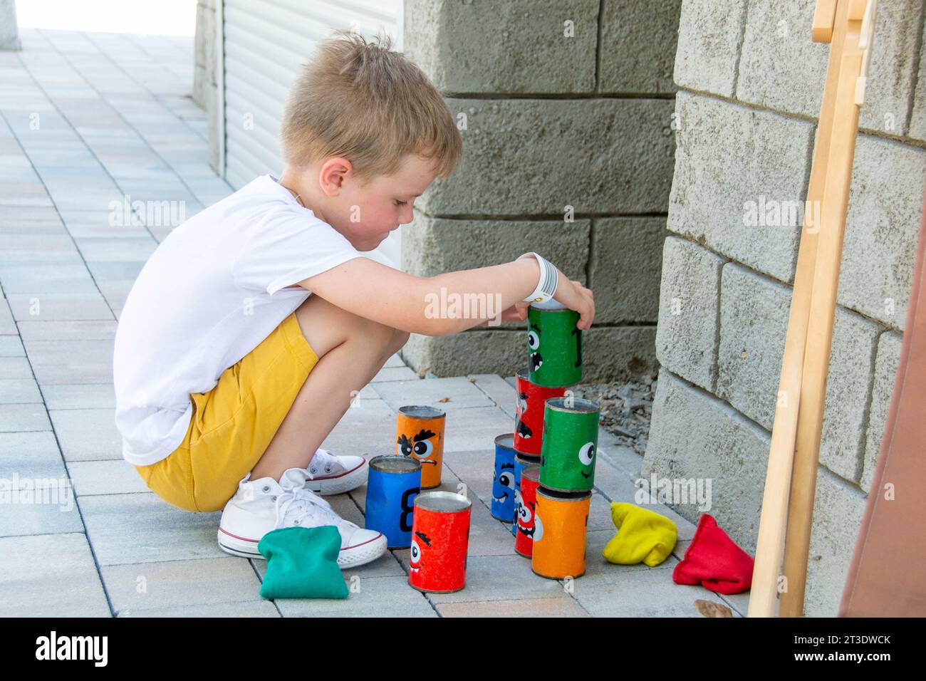 Little children run around and play in the playground. Game center for ...