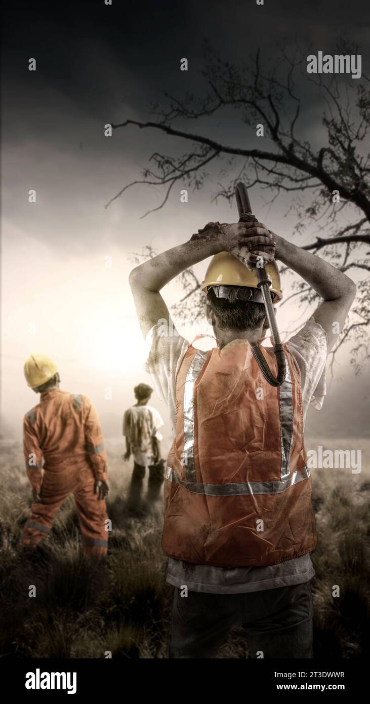 Rear view of a scary construction worker zombie with blood and wounds ...