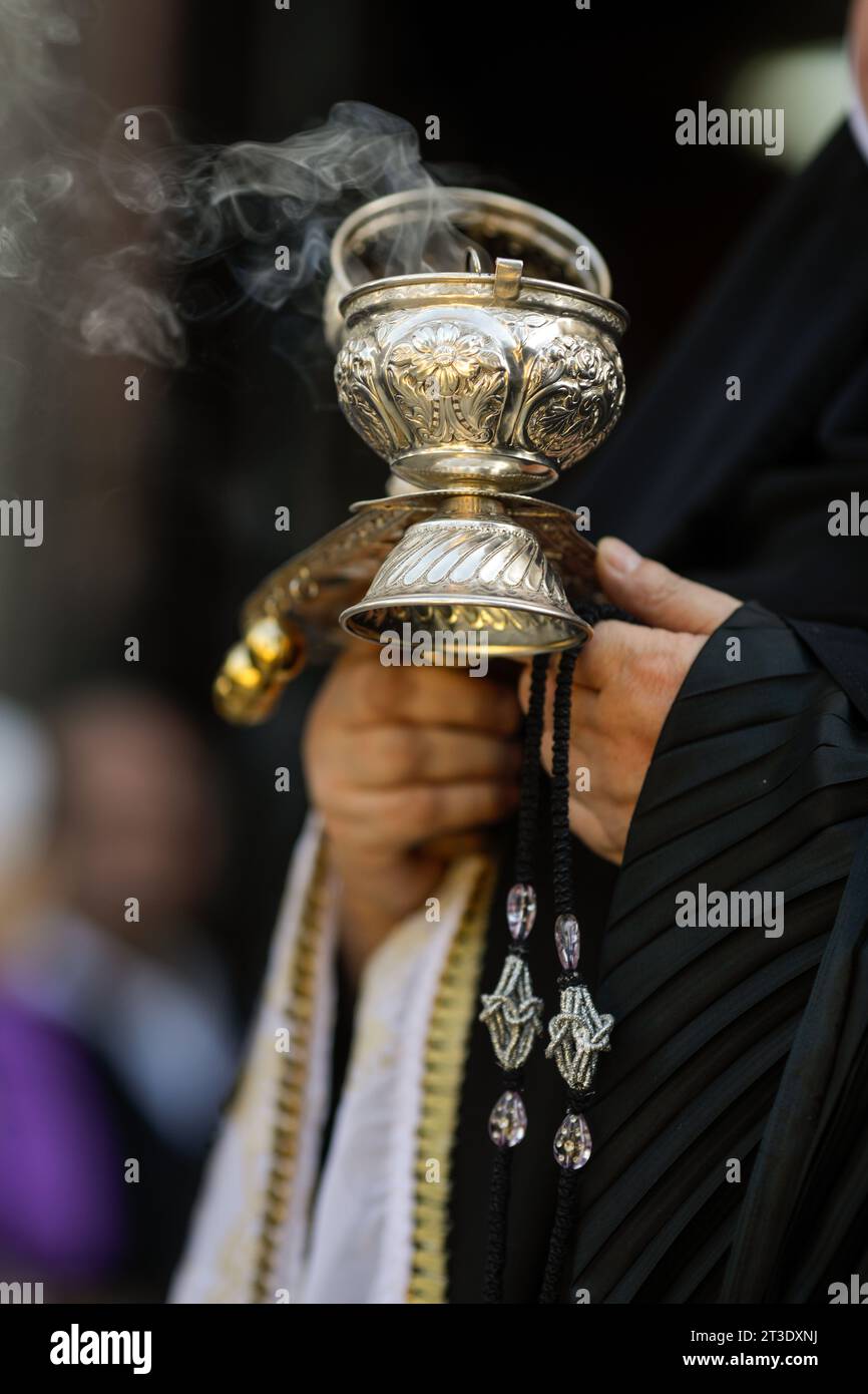 Shallow depth of field (selective focus) details with the hand of a orthodox Christian nun ...