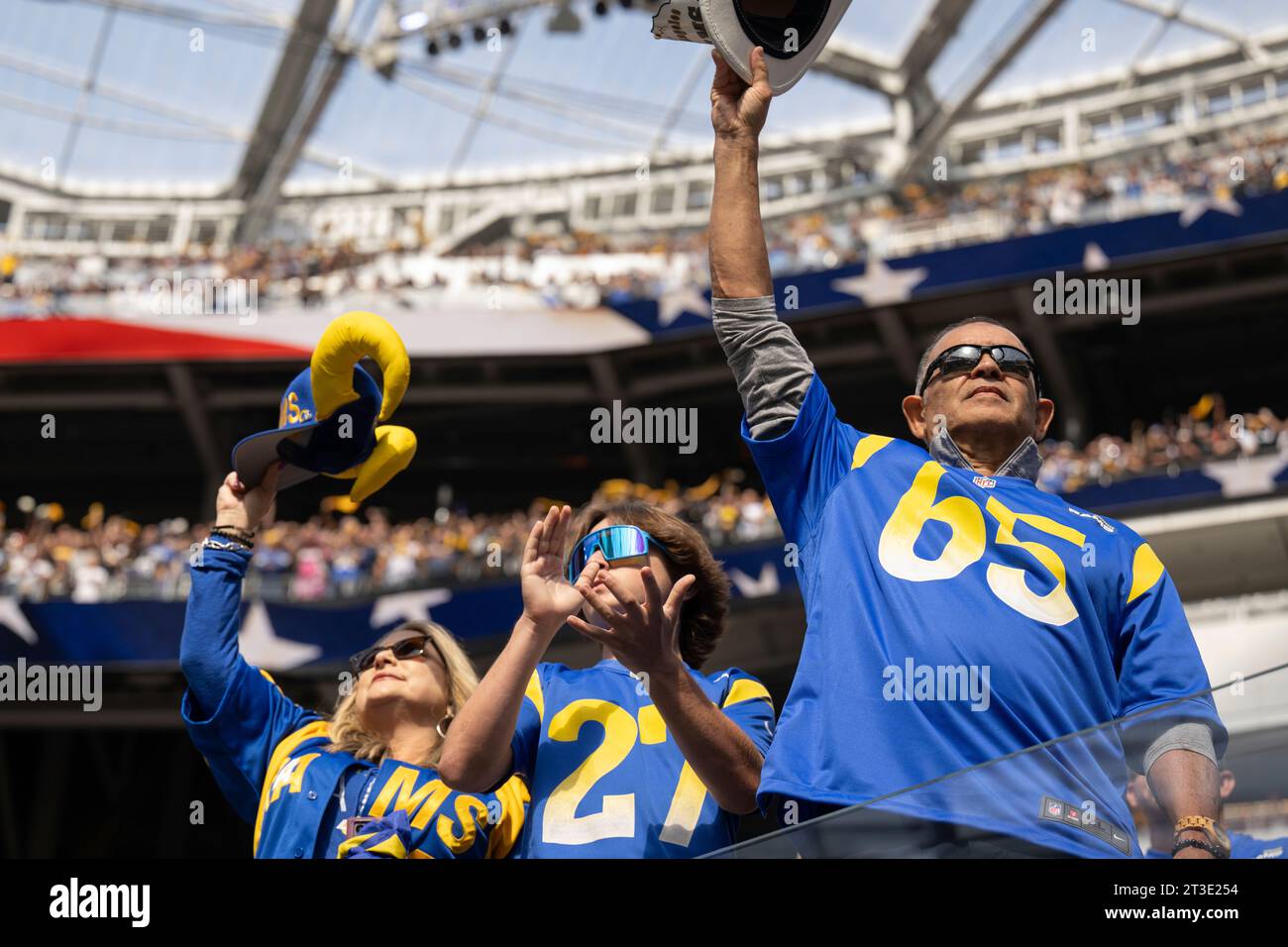 Los Angeles Rams fans cheer before an NFL football game against the ...