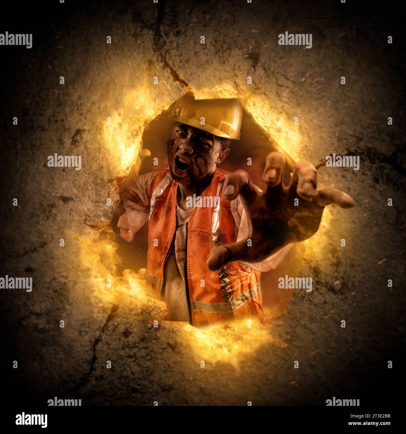 A scary construction worker zombie with blood and wounds on his body ...