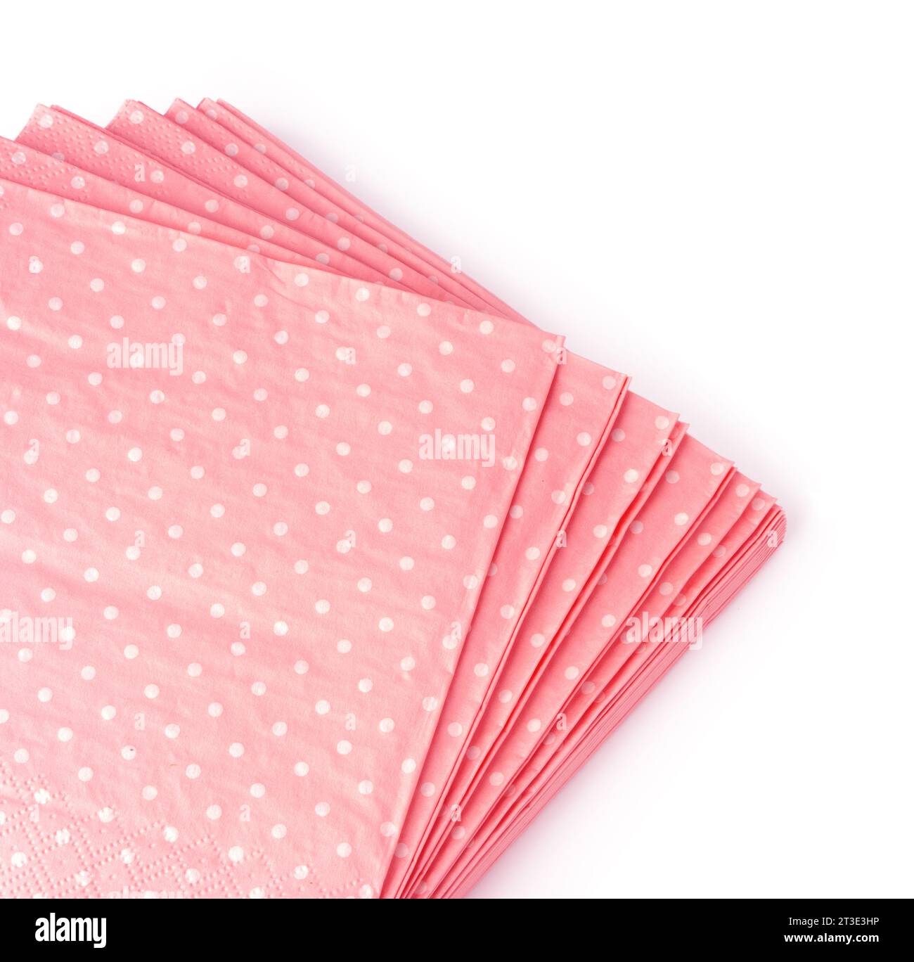 Stack of pink dotted paper napkins on white background Stock Photo - Alamy