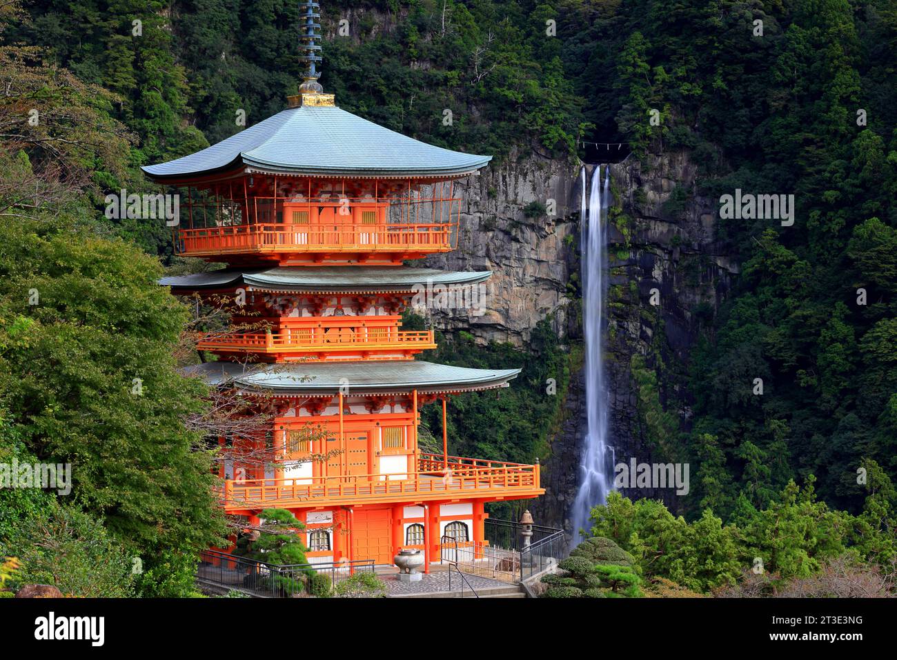 Seianto-ji Temple Pagoda against the backdrop of the Nachi Falls at ...