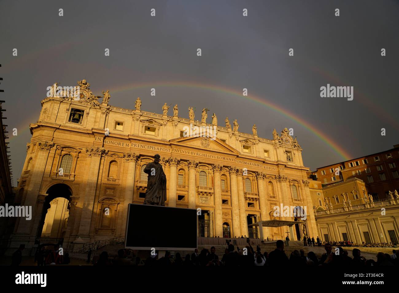 A rainbow shines over St.Peter's Basilica prior to the start of Pope ...