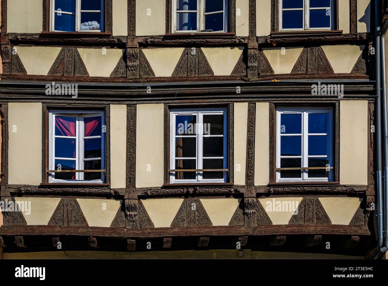 Ornate traditional half timbered houses with steep roofs in the old ...