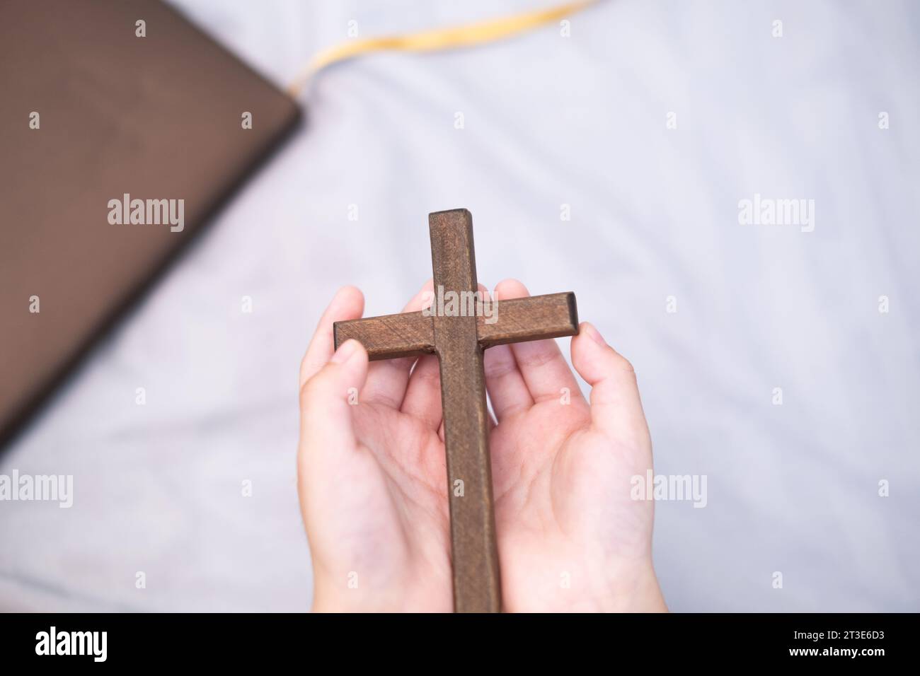 Woman holding rosary holy bible hi-res stock photography and images - Alamy